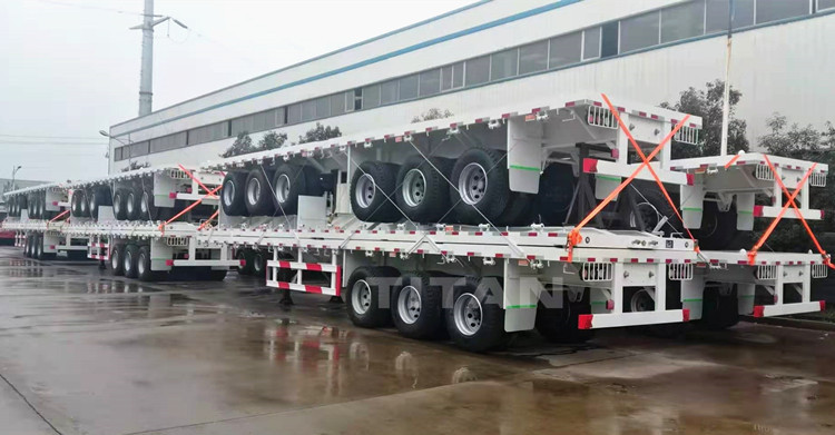 Multi types of flatbed trailers. Tri axle trailer, container tipper and ...
